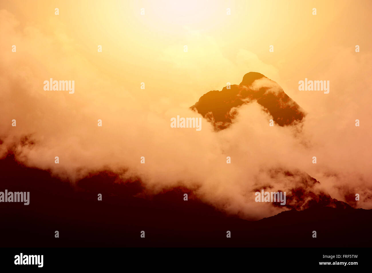 Sunset over mountain peak. Nature in mountains Stock Photo - Alamy