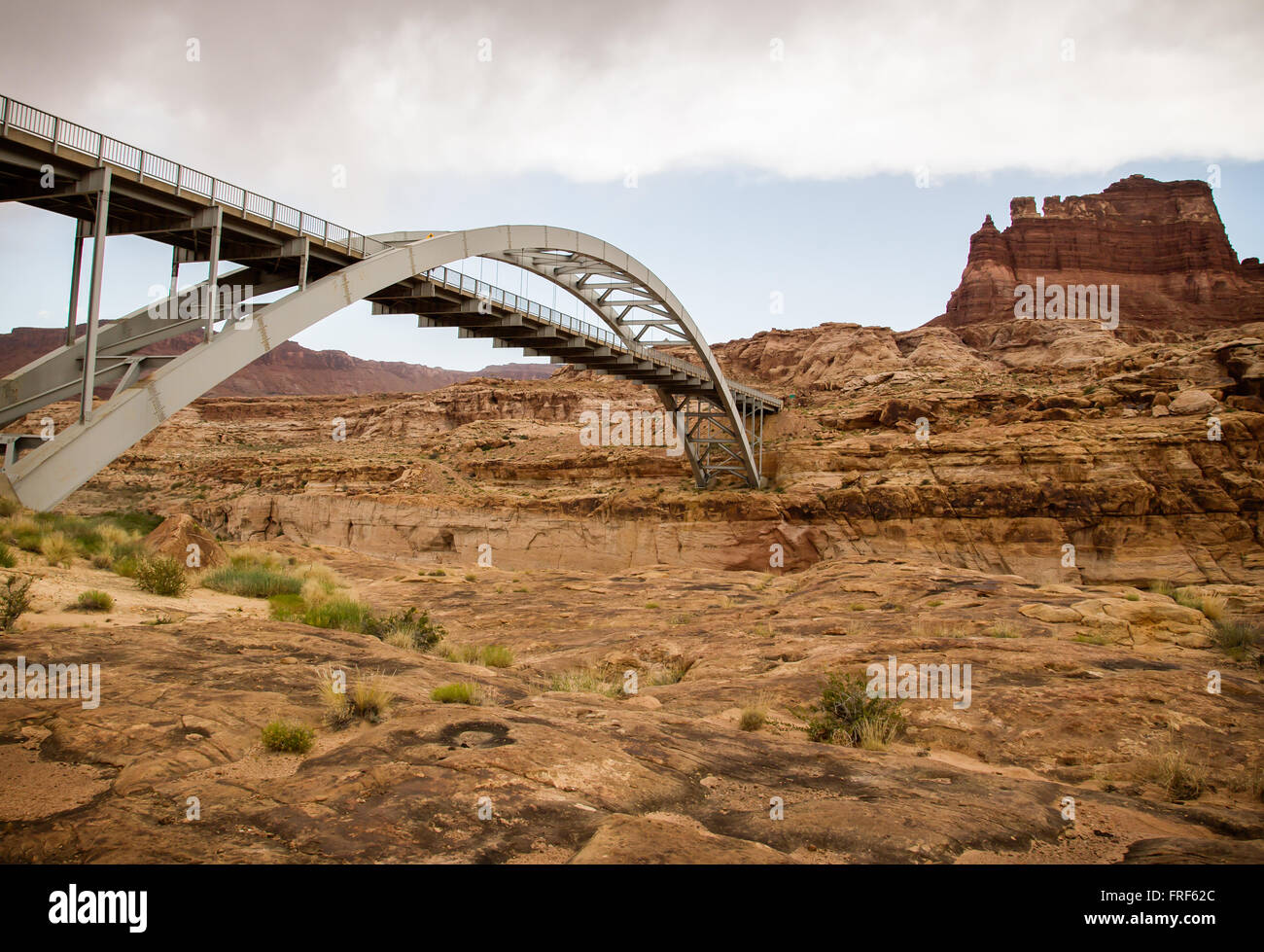 A large metal bridge over the Colorado River on highway 95 at Hite ...