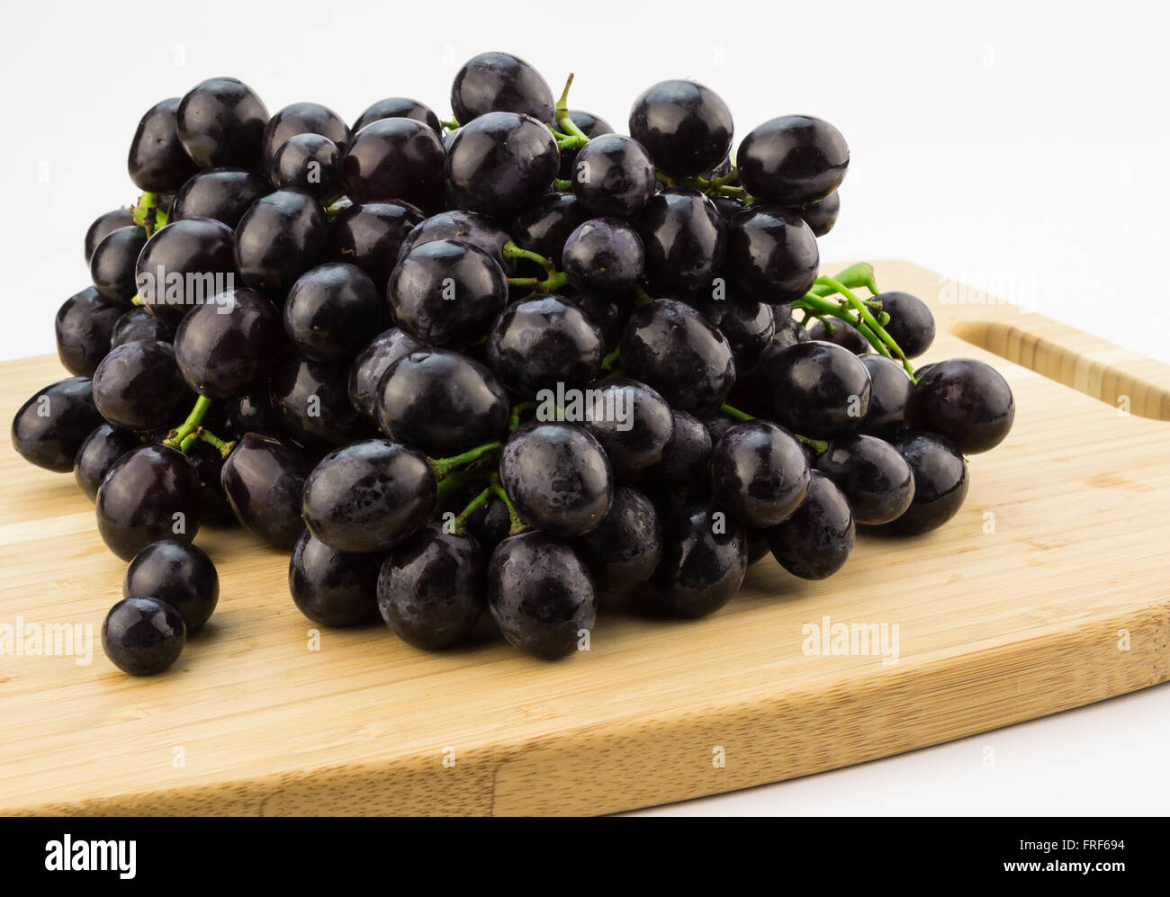 Grapes on board hi-res stock photography and images - Alamy