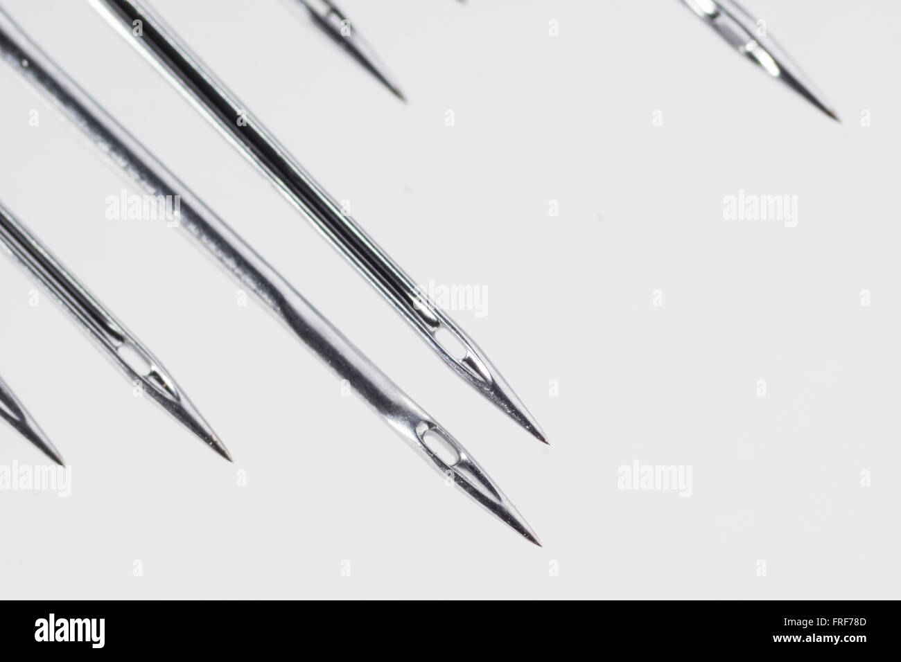 Industrial machine sewing needle. High resolution image depicting ...