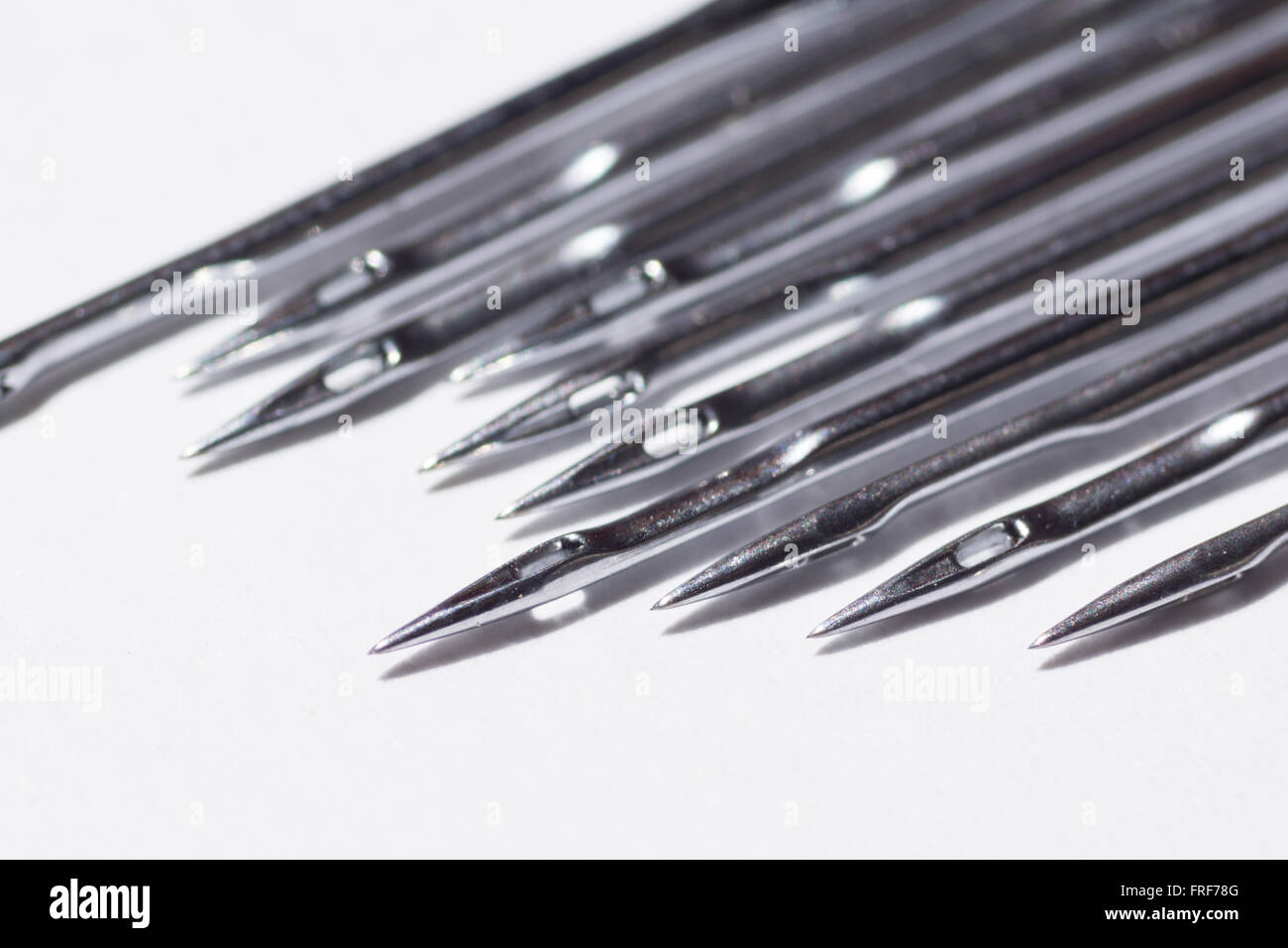 Industrial machine sewing needle. High resolution image depicting ...