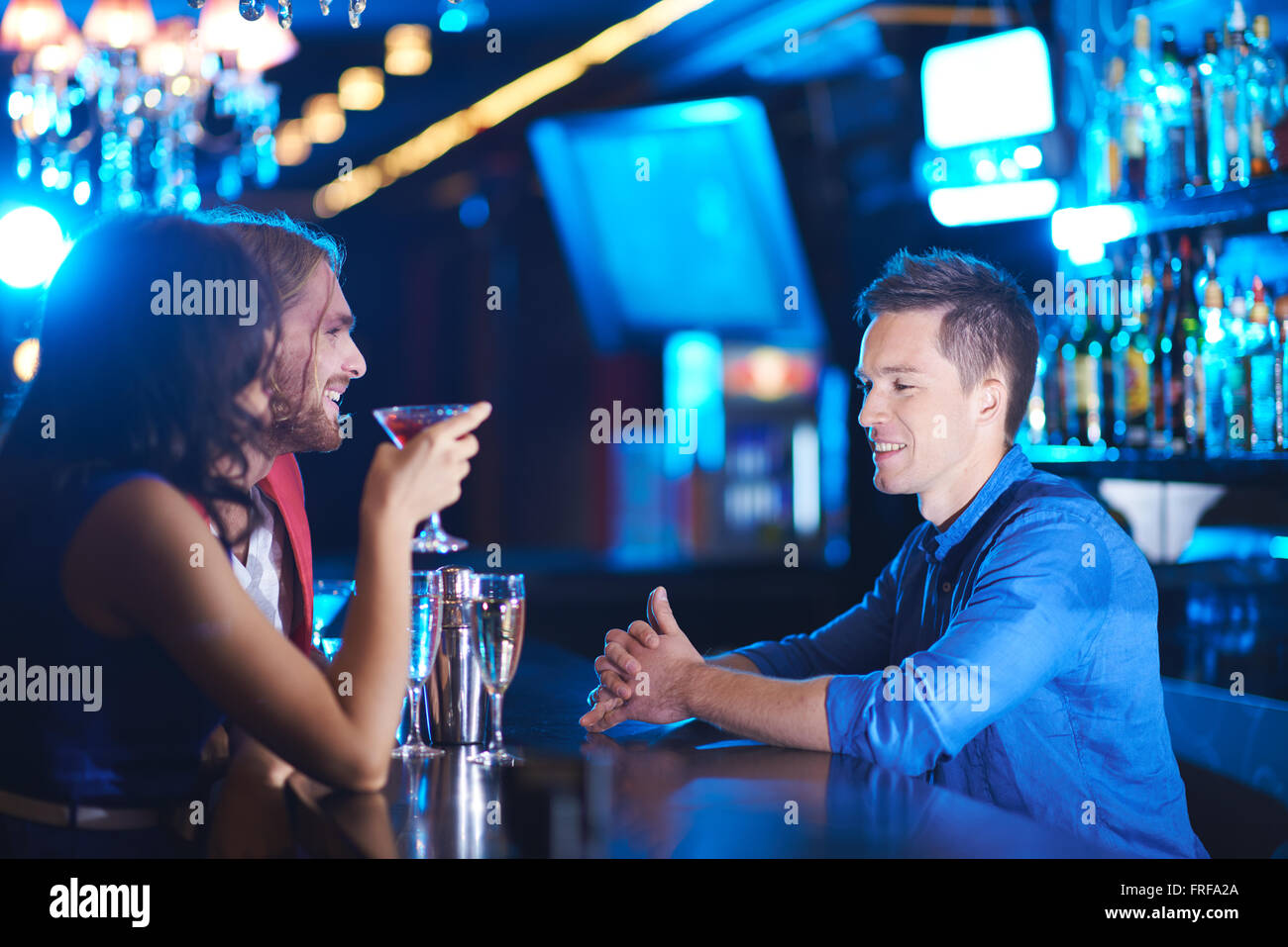 Talking by drink Stock Photo - Alamy