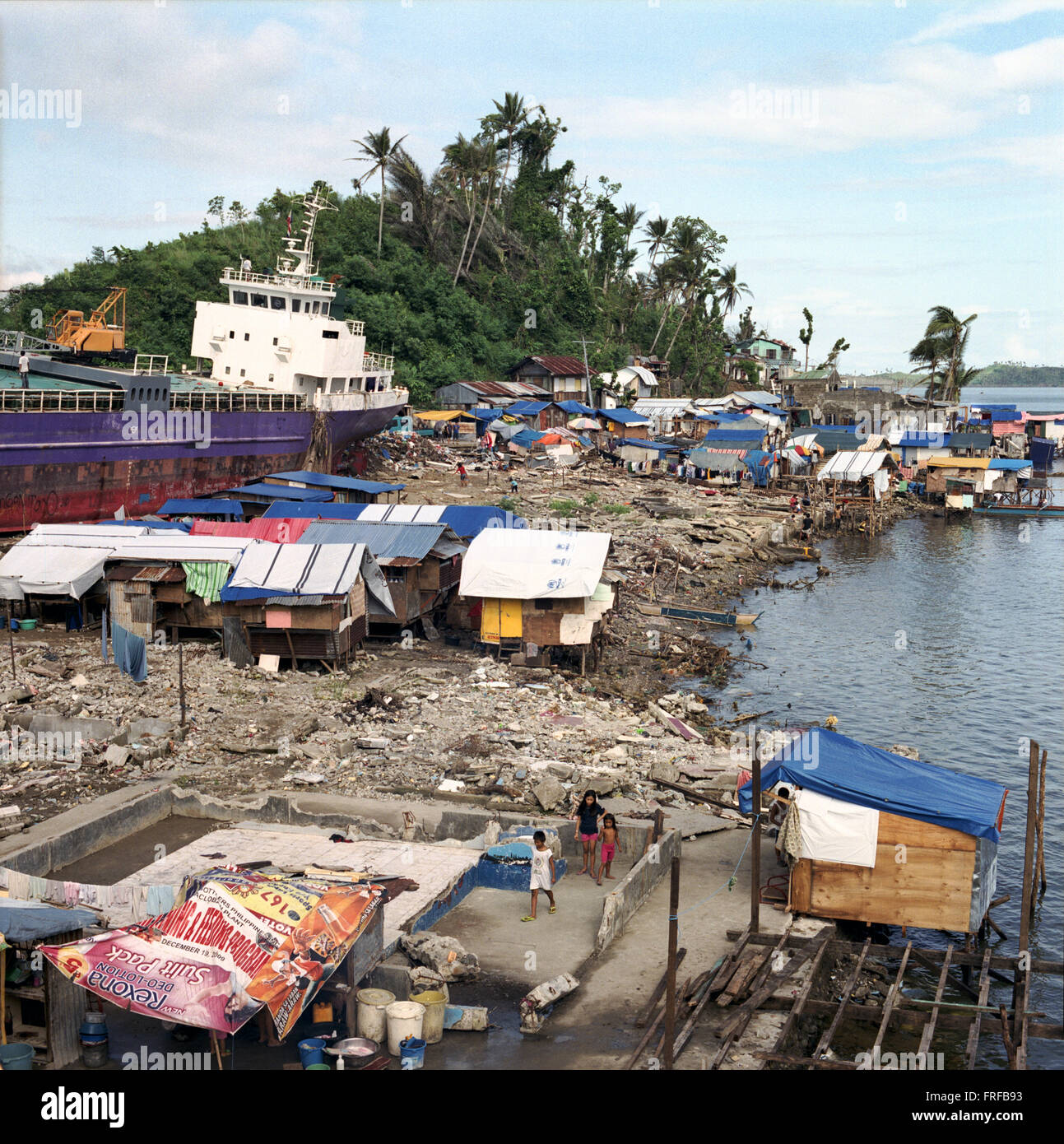 Anibong; Tacloban; Leyte; Philippines - January 6, 2014. People have ...