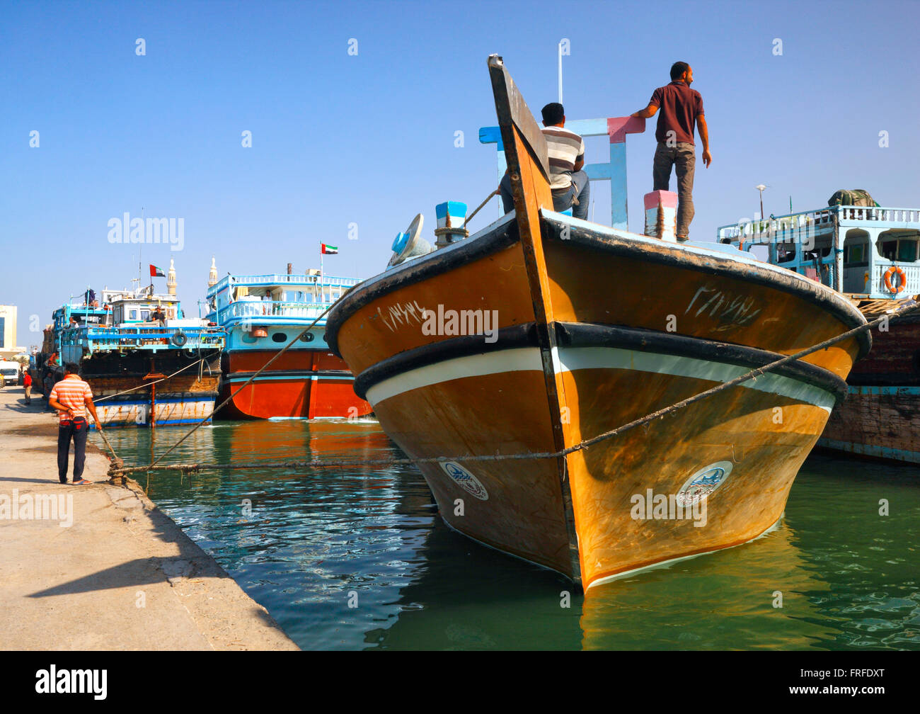 Dubai - Sharjah. Dhow boats in the port in Sharjah Stock Photo - Alamy