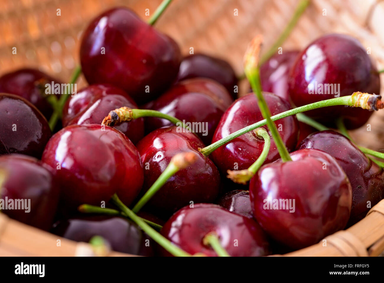 macro cherries in the basket Stock Photo - Alamy