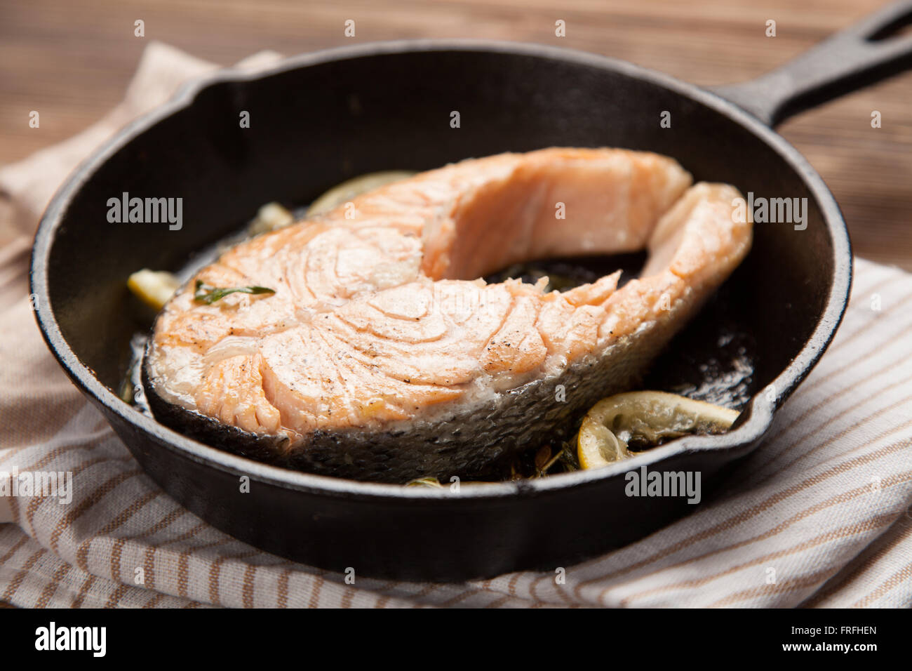 Fried salmon slice Stock Photo - Alamy