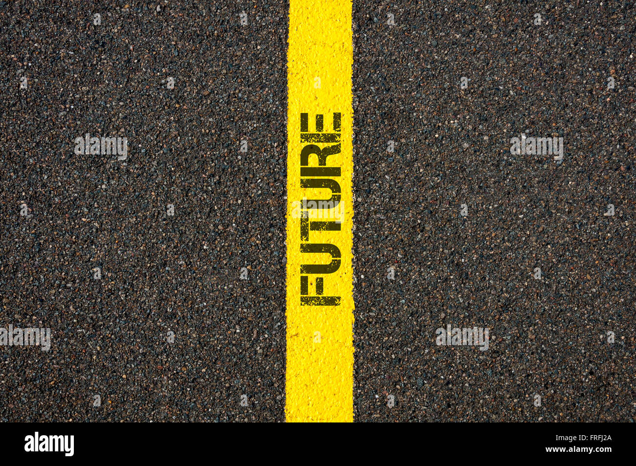 Road marking yellow paint dividing line with word FUTURE, concept image ...