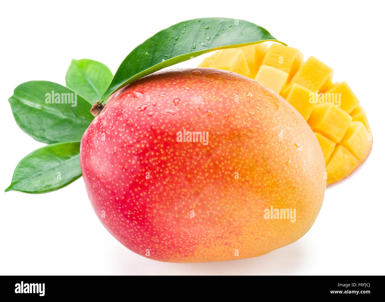 Mango cubes and mango fruit. Isolated on a white background Stock Photo ...
