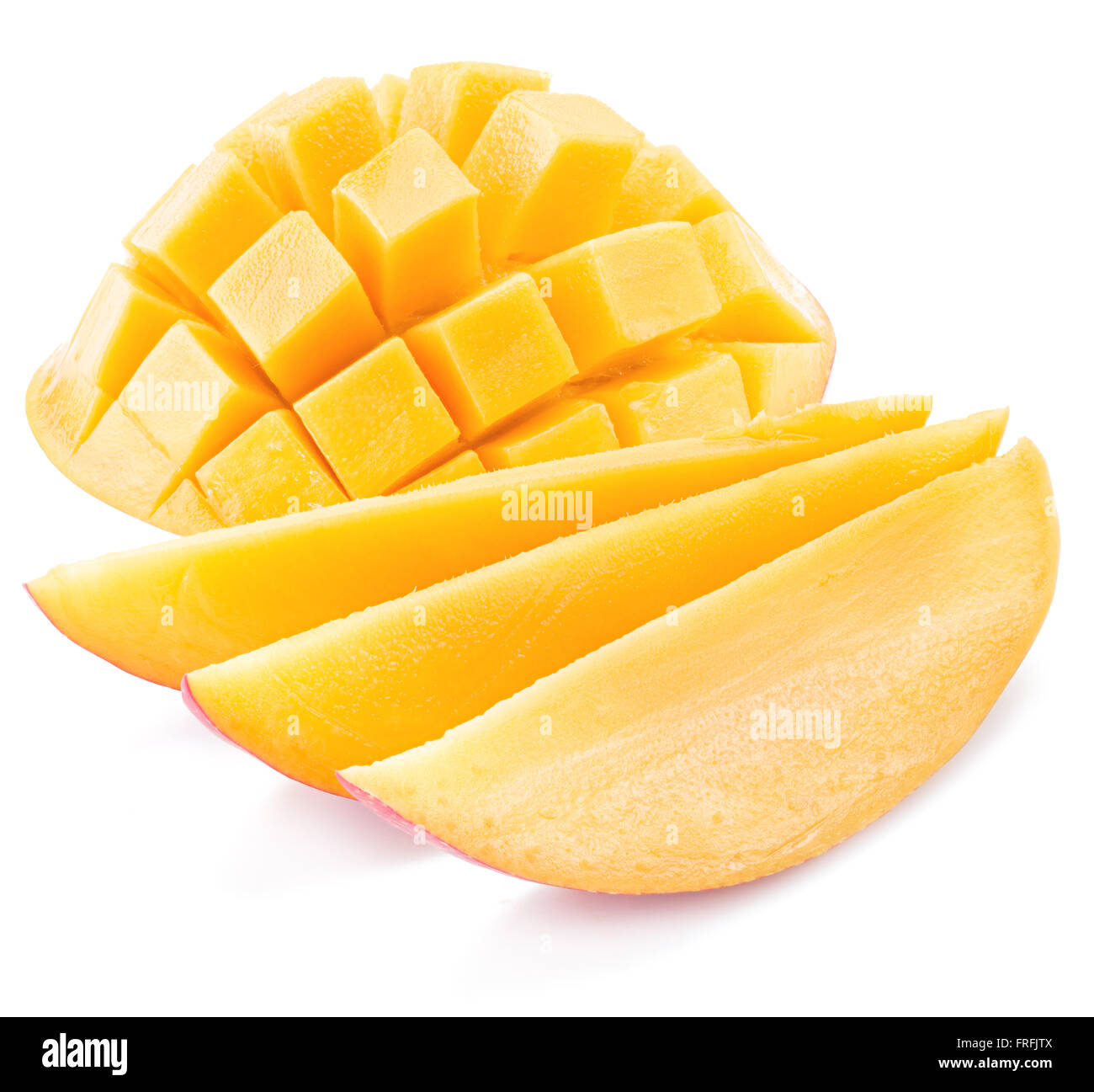 Mango cubes and slices. Isolated on a white background Stock Photo - Alamy