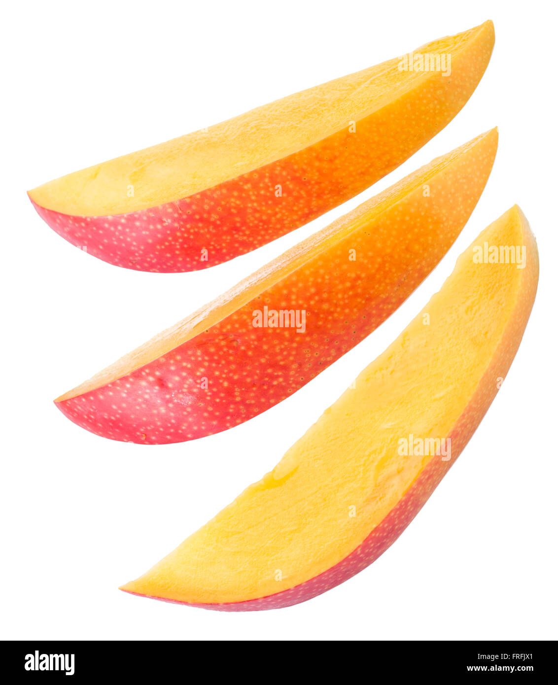 Slices of mango fruit over white. File contains clipping paths Stock ...