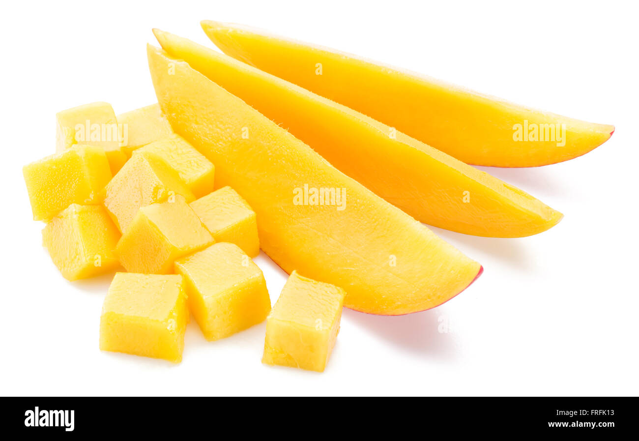 Mango cubes and slices. Isolated on a white background Stock Photo - Alamy