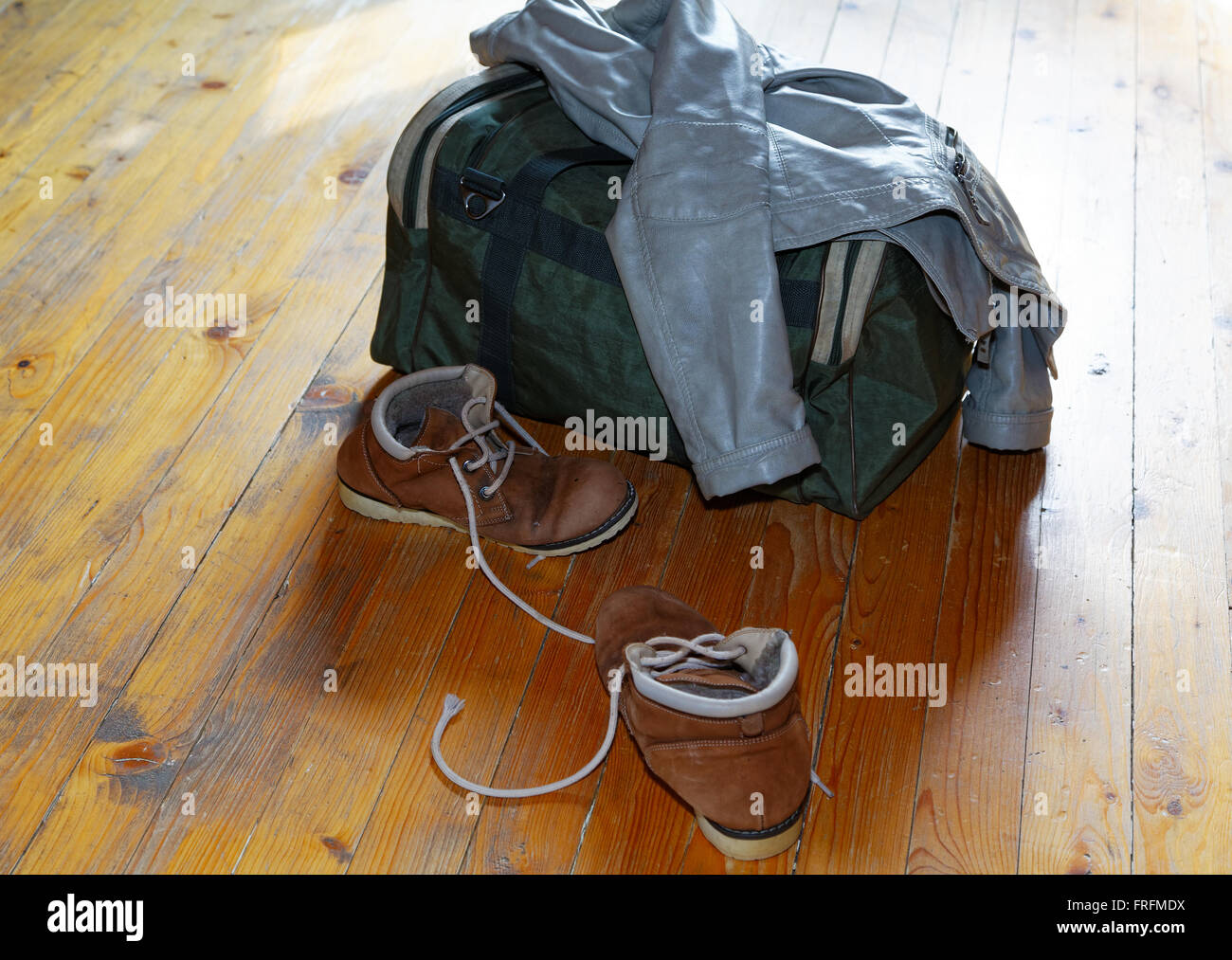 lady's jacket and shoes on the floor of the room Stock Photo - Alamy
