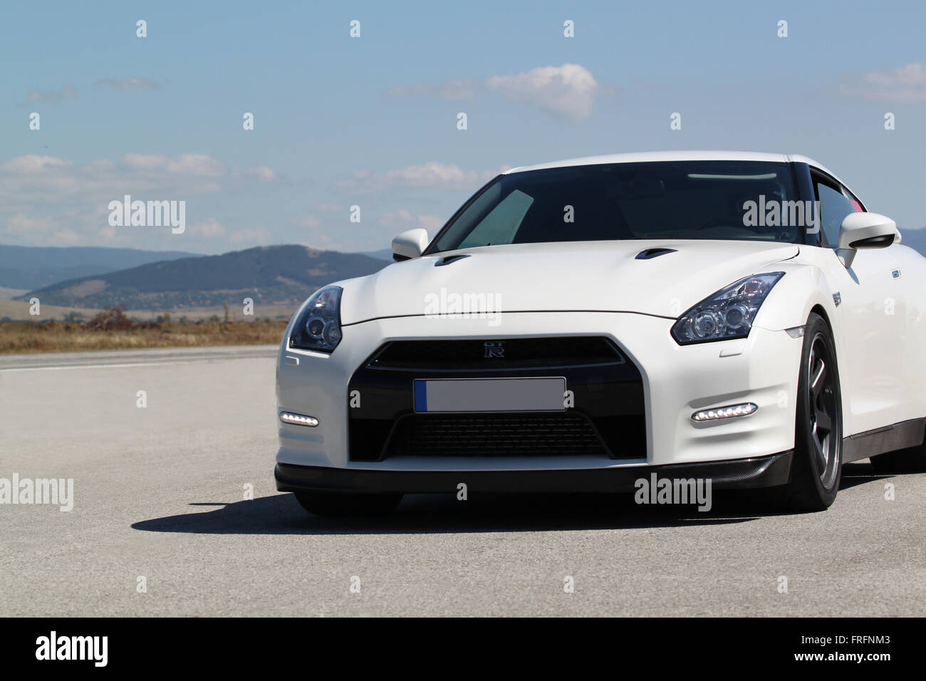 Nissan GT-R, drag race challenge with cars Stock Photo - Alamy