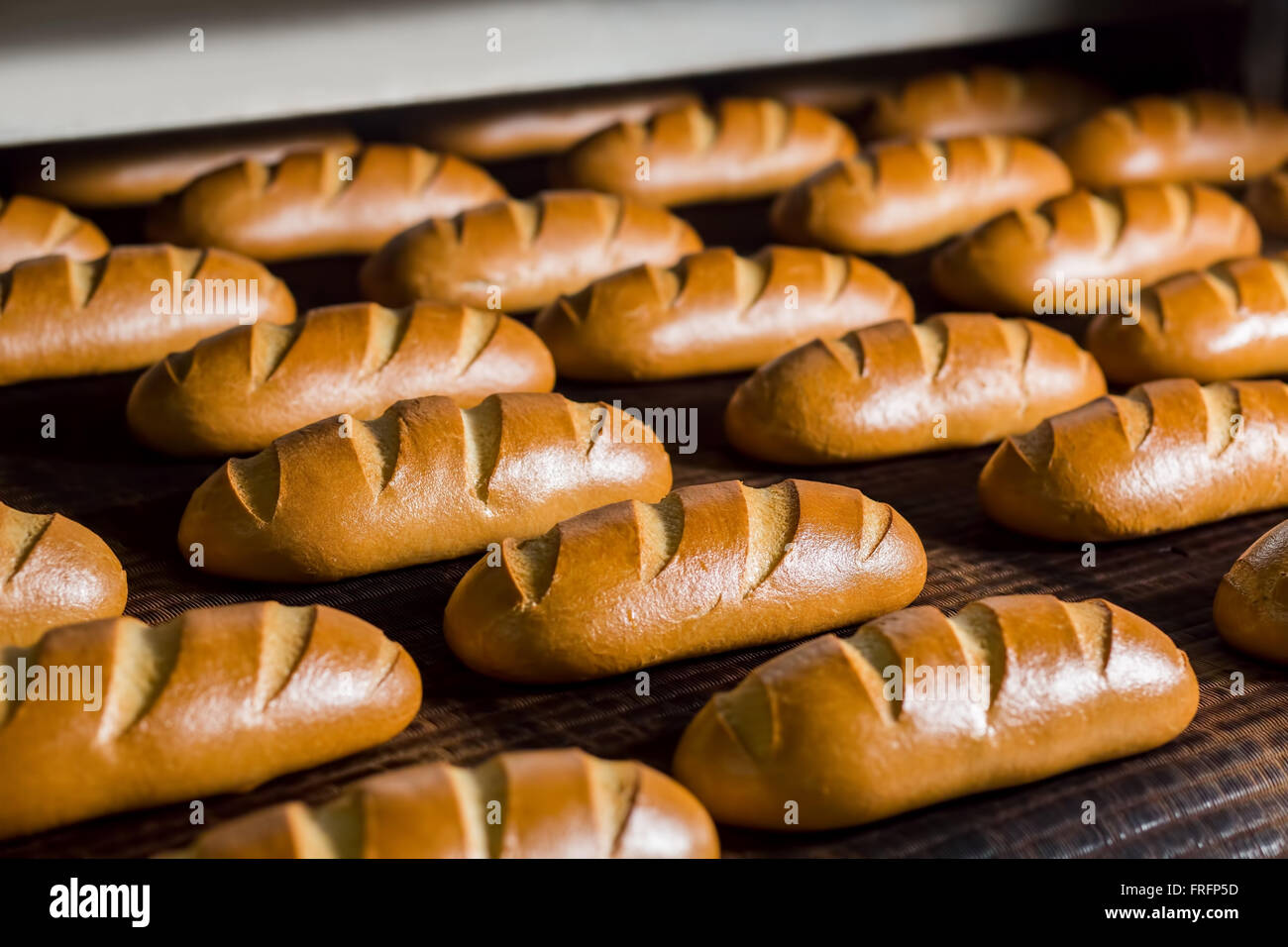 Bread in the furnace Stock Photo - Alamy