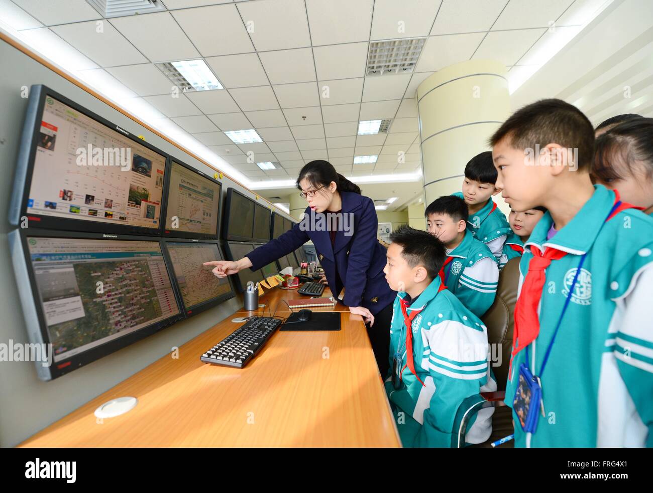 Cangzhou. 23rd Mar, 2016. Young students learn about weather forecast ...
