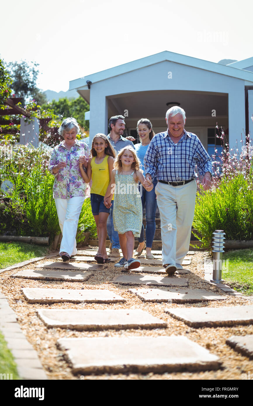 Adult and child walking to house hi-res stock photography and images ...