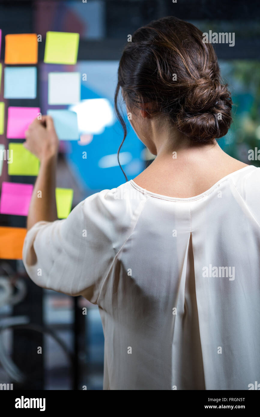 Looking at note hi-res stock photography and images - Alamy