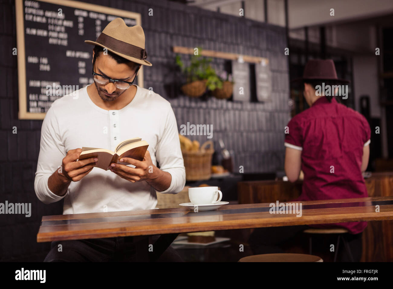Man reading a book Stock Photo - Alamy