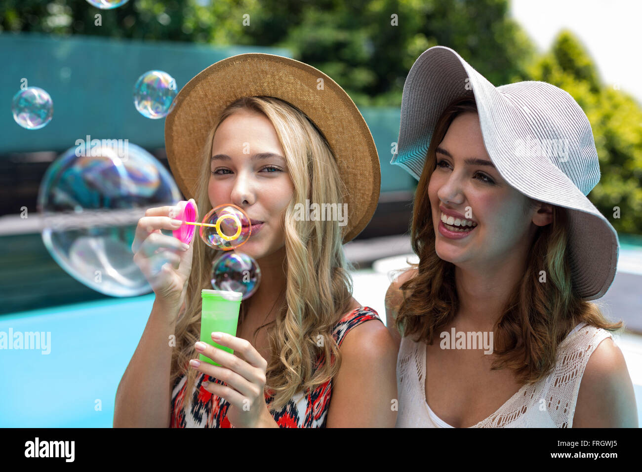 Beautiful blowing bubble wand Stock Photo - Alamy