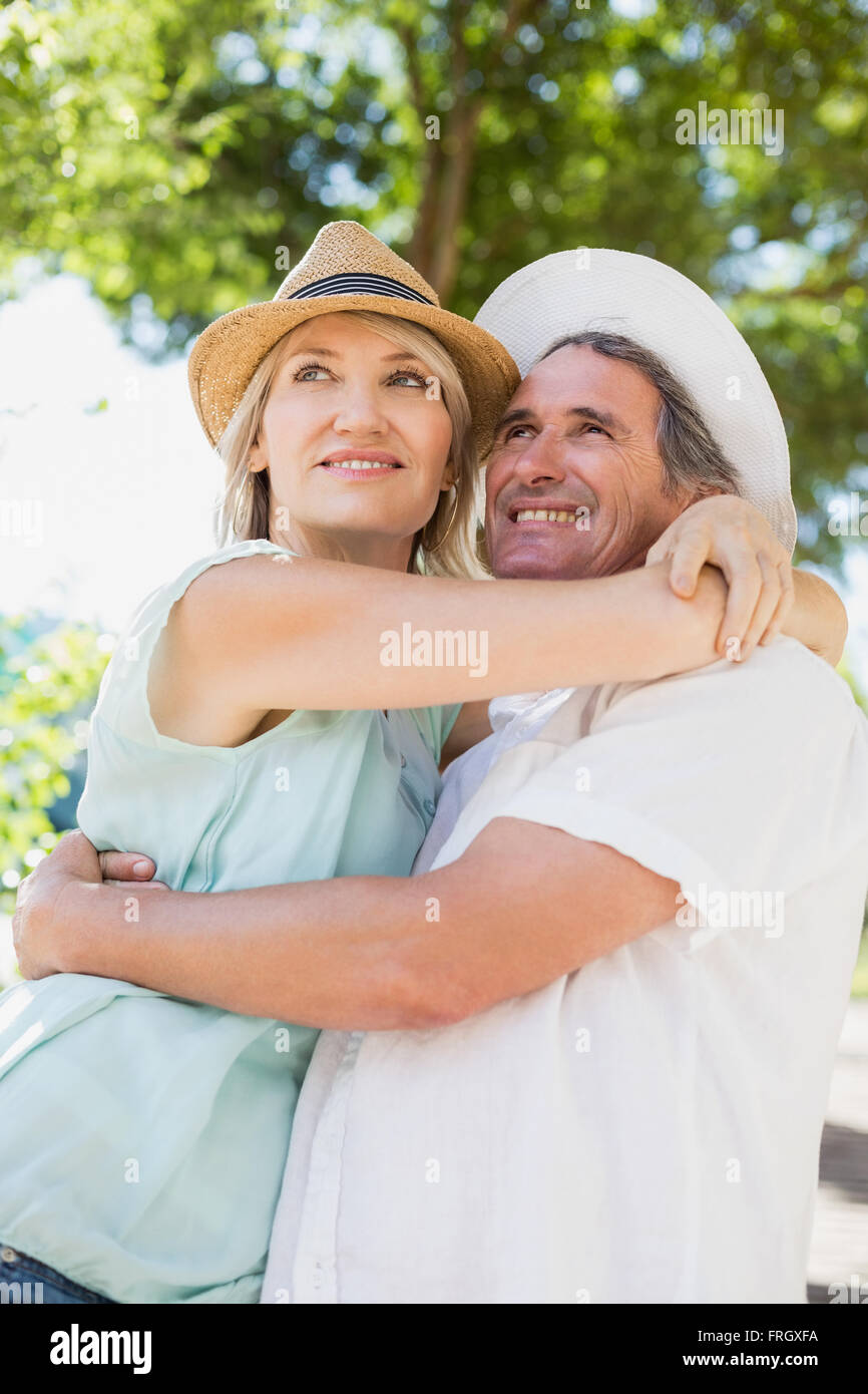 Happy couple embracing Stock Photo - Alamy