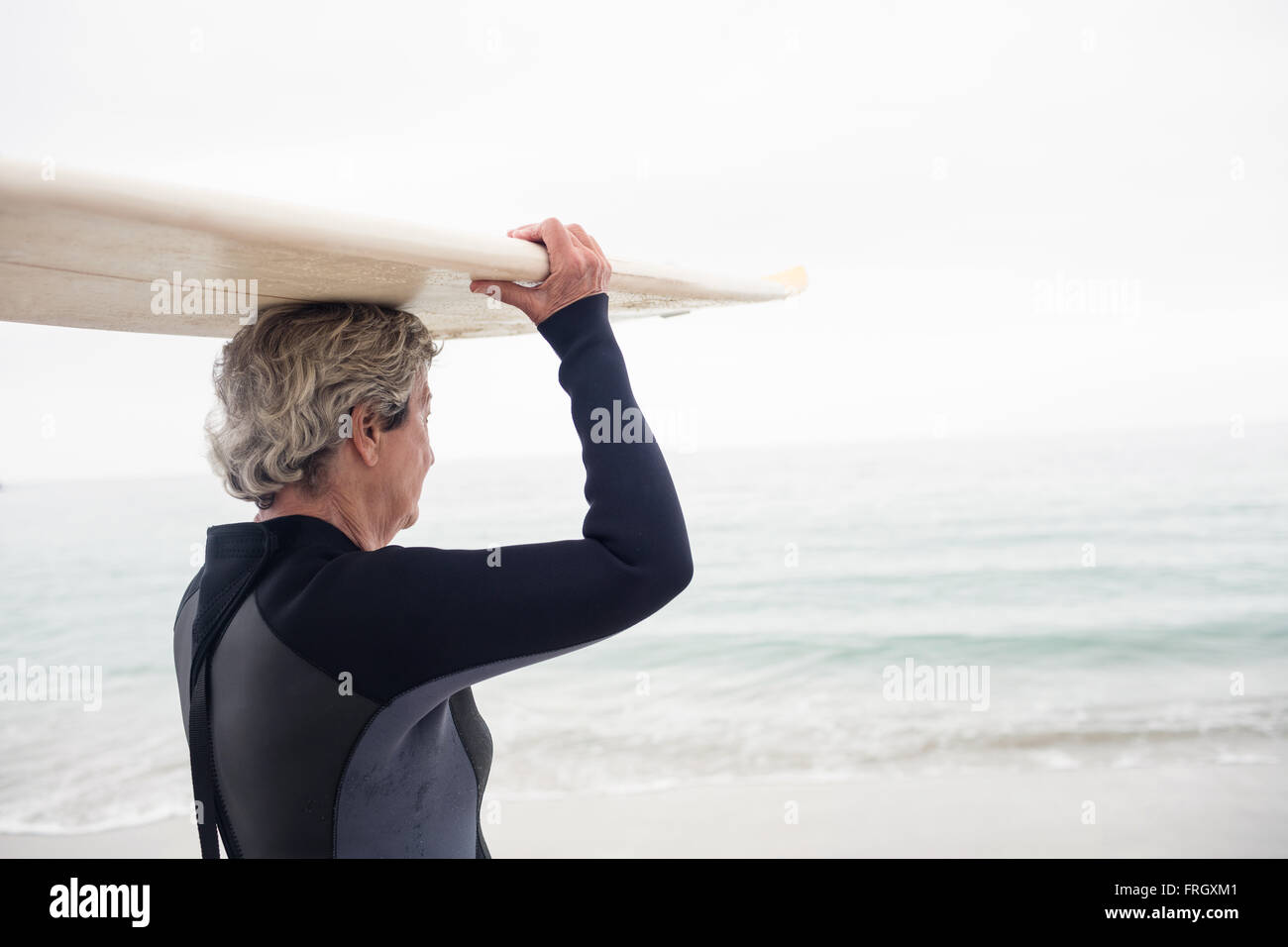 Surfboard over sea wave hi-res stock photography and images - Alamy