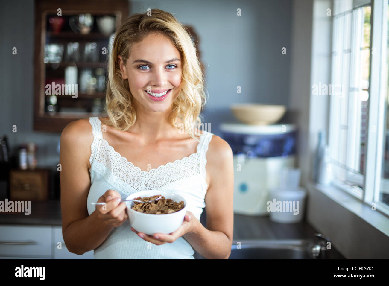 Woman breakfast kitchen hi-res stock photography and images - Alamy