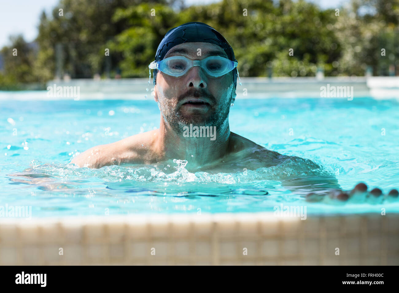 Fit swimmer in swimming pool Stock Photo - Alamy