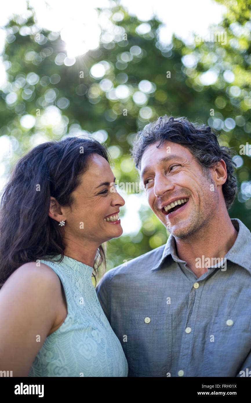 Joyful couple in love standing hi-res stock photography and images - Alamy