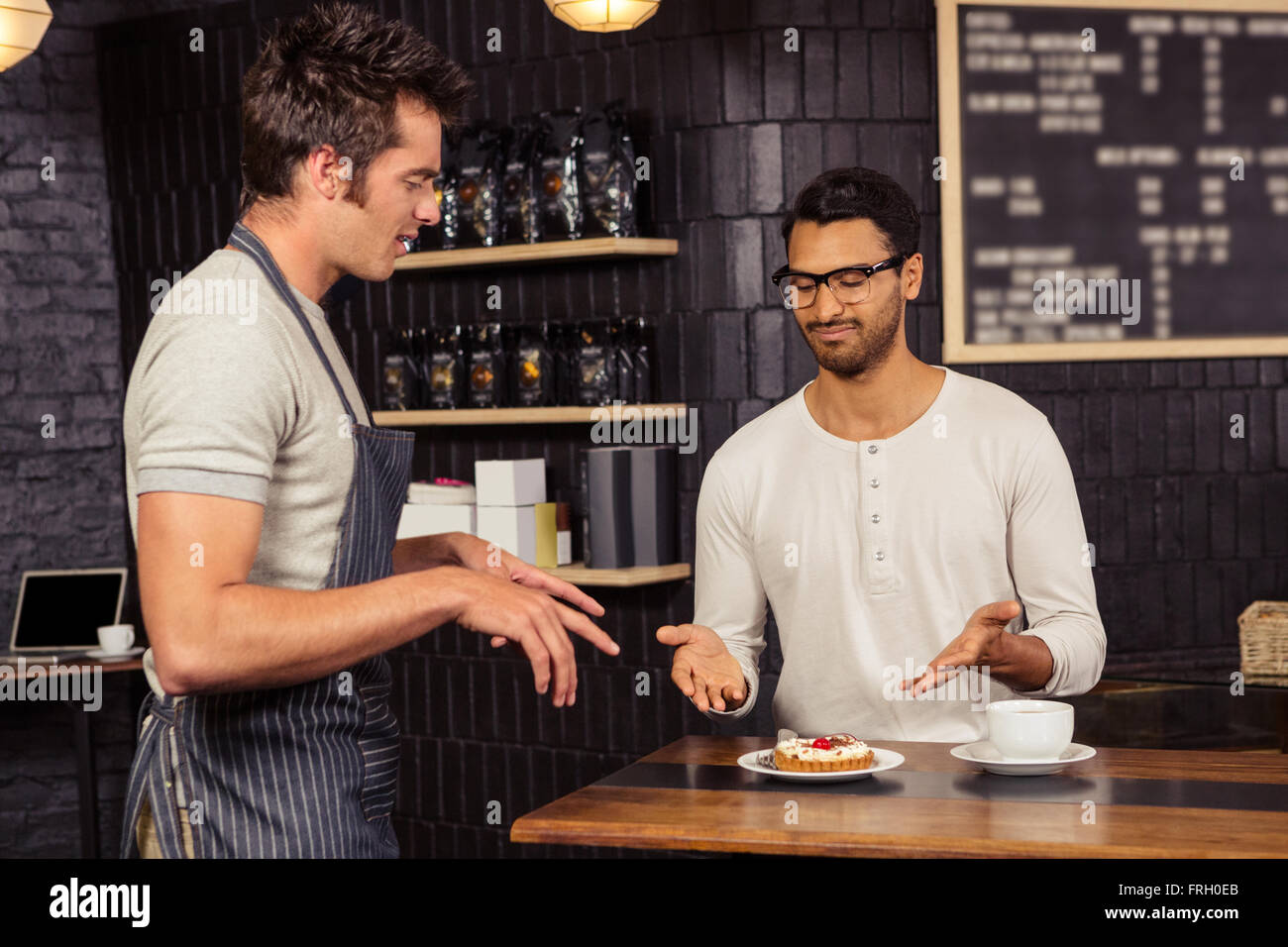 Cafe staff customer interaction hi-res stock photography and images - Alamy