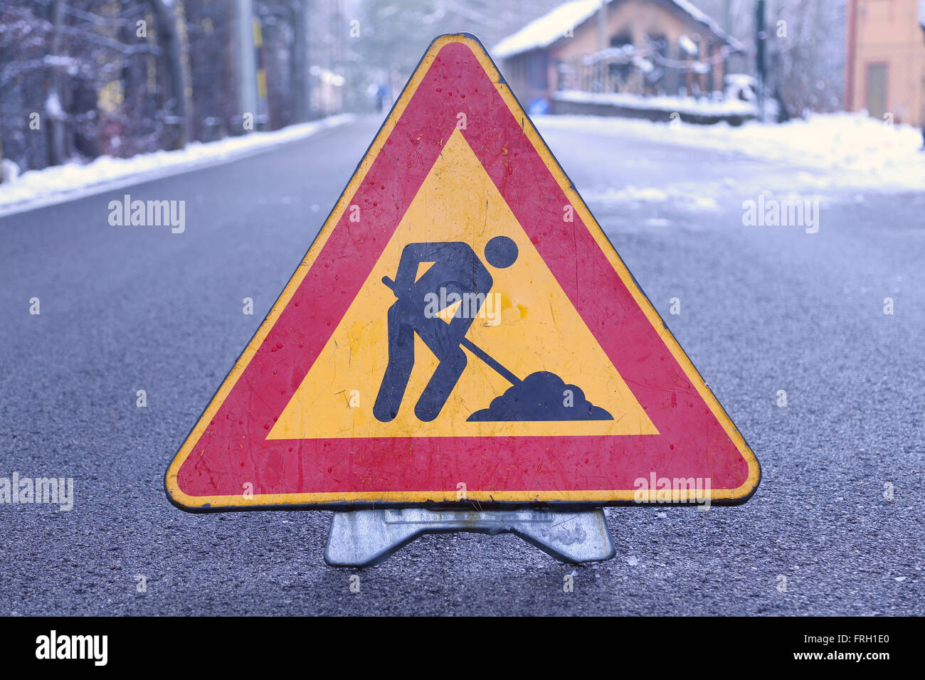 triangle road sign work in progress in the road with silhouette Stock ...