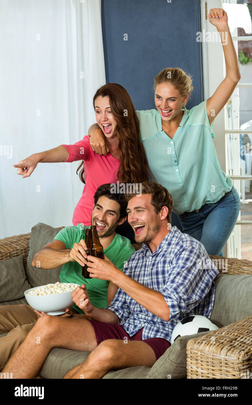 Watching football female fan cheering hi-res stock photography and ...