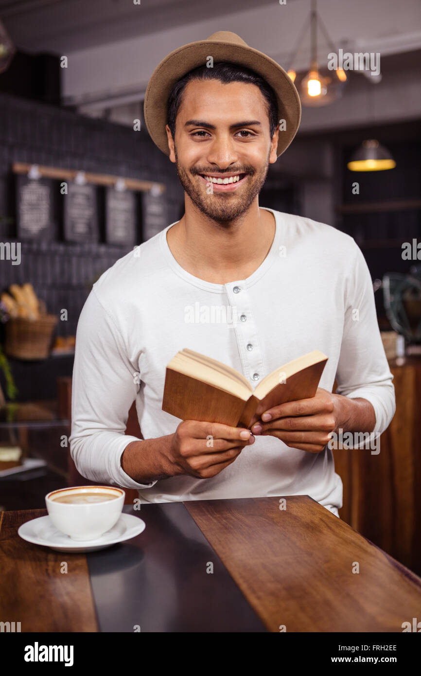 Man reading a book Stock Photo - Alamy