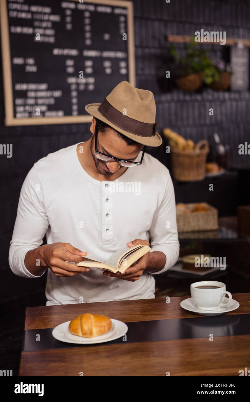 Man reading a book Stock Photo - Alamy