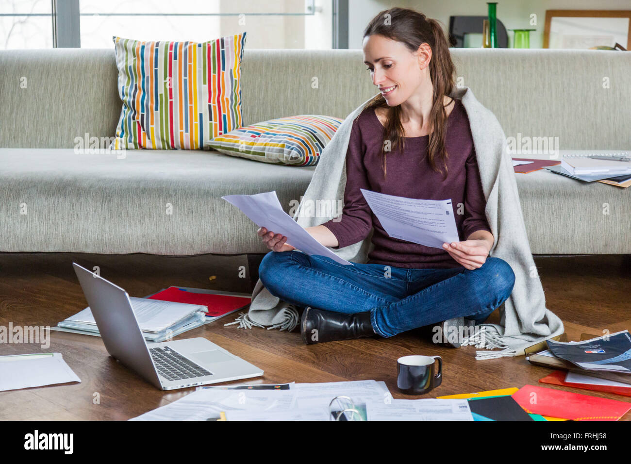 Woman with administrative papers Stock Photo - Alamy
