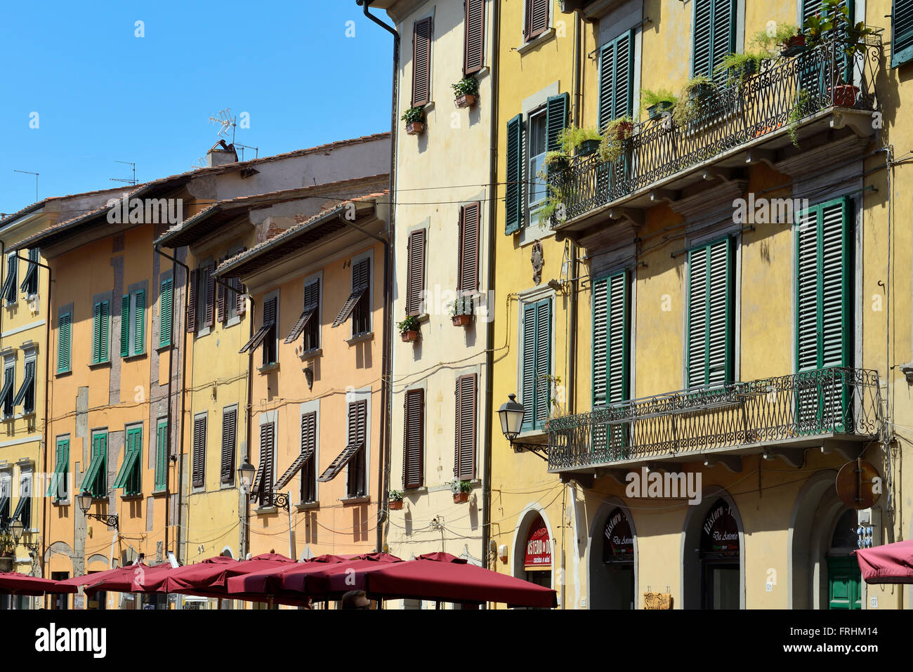 Rustic colourful Italian buildings, Via Santa Maria, Pisa, Toscana ...