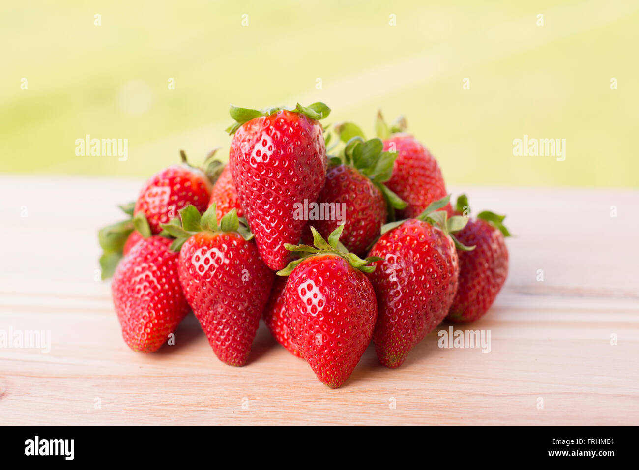 strawberries on garden's table, outdoor picture Stock Photo - Alamy