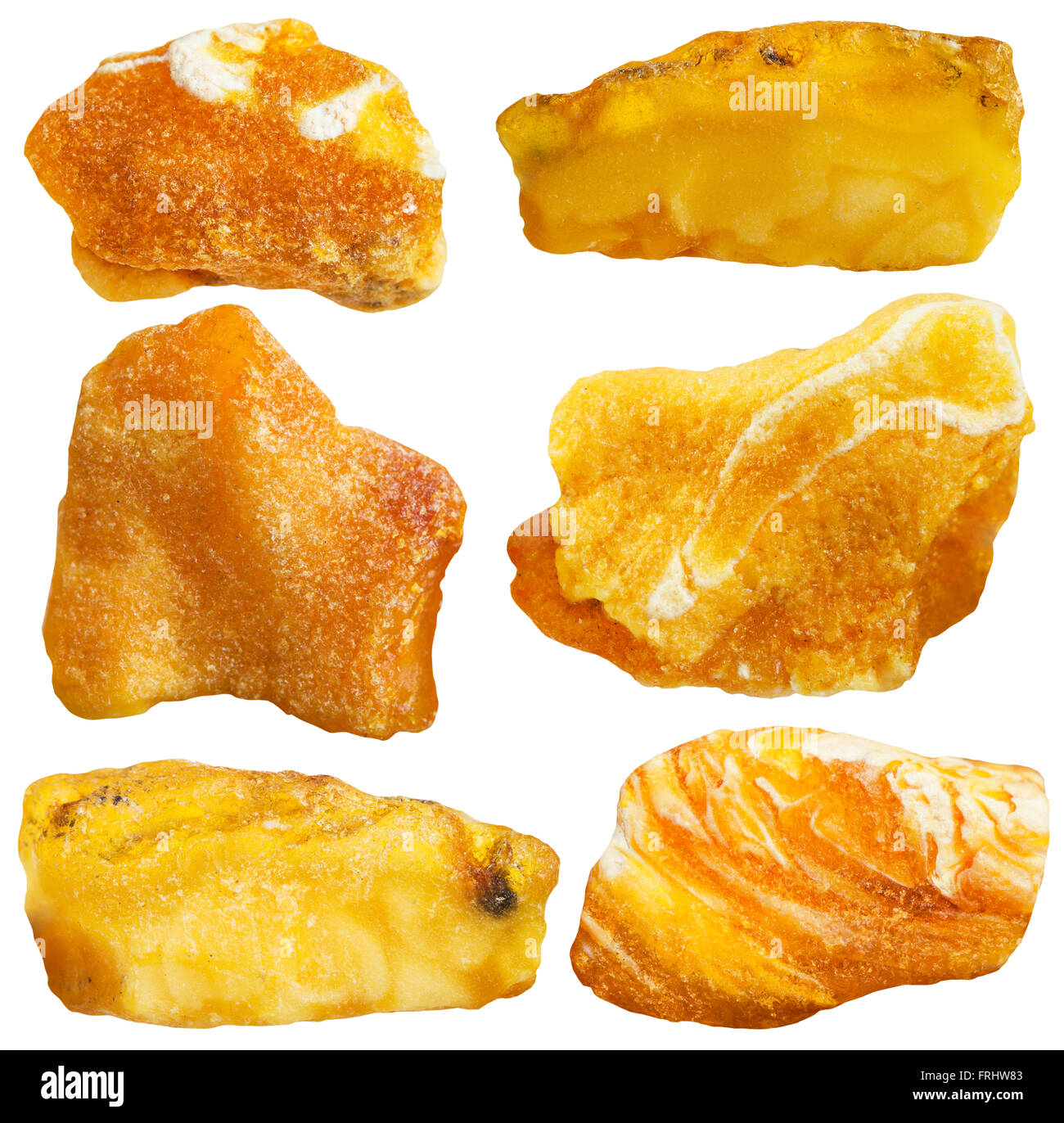 set of rough amber mineral gem stones isolated on white background ...