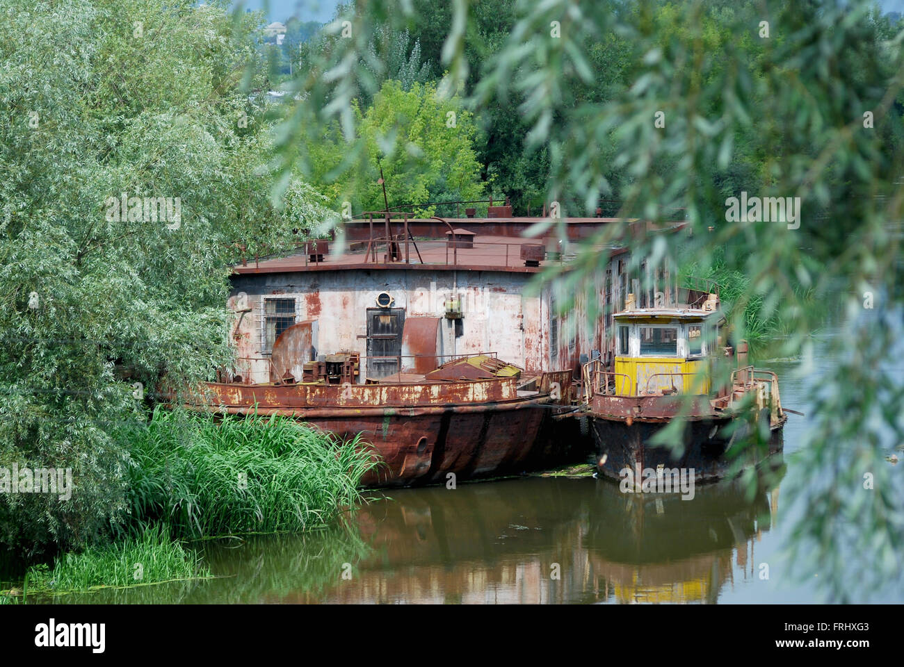 Old rusty barge and tug Stock Photo - Alamy