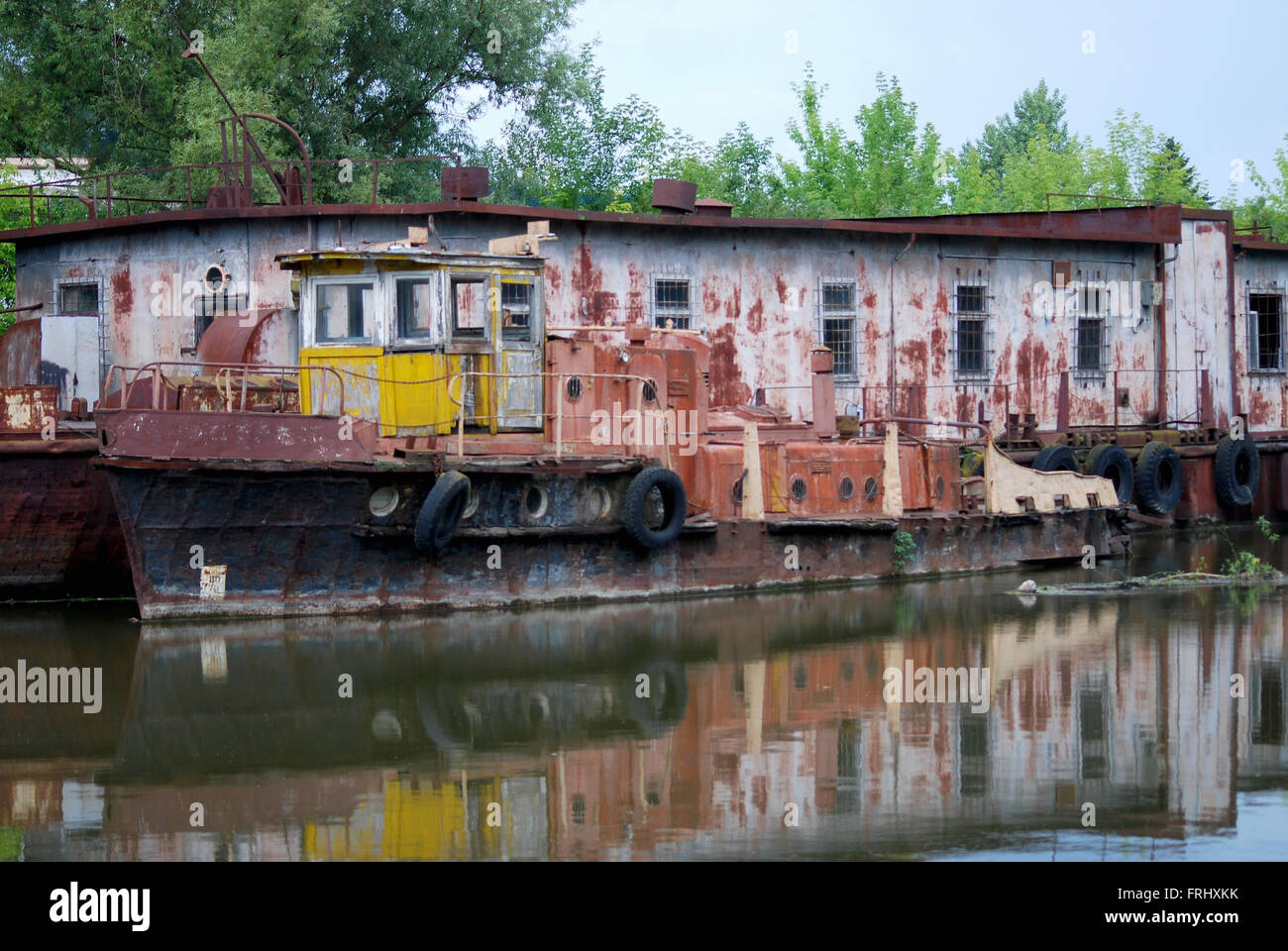 Old rusty barge and tug Stock Photo - Alamy