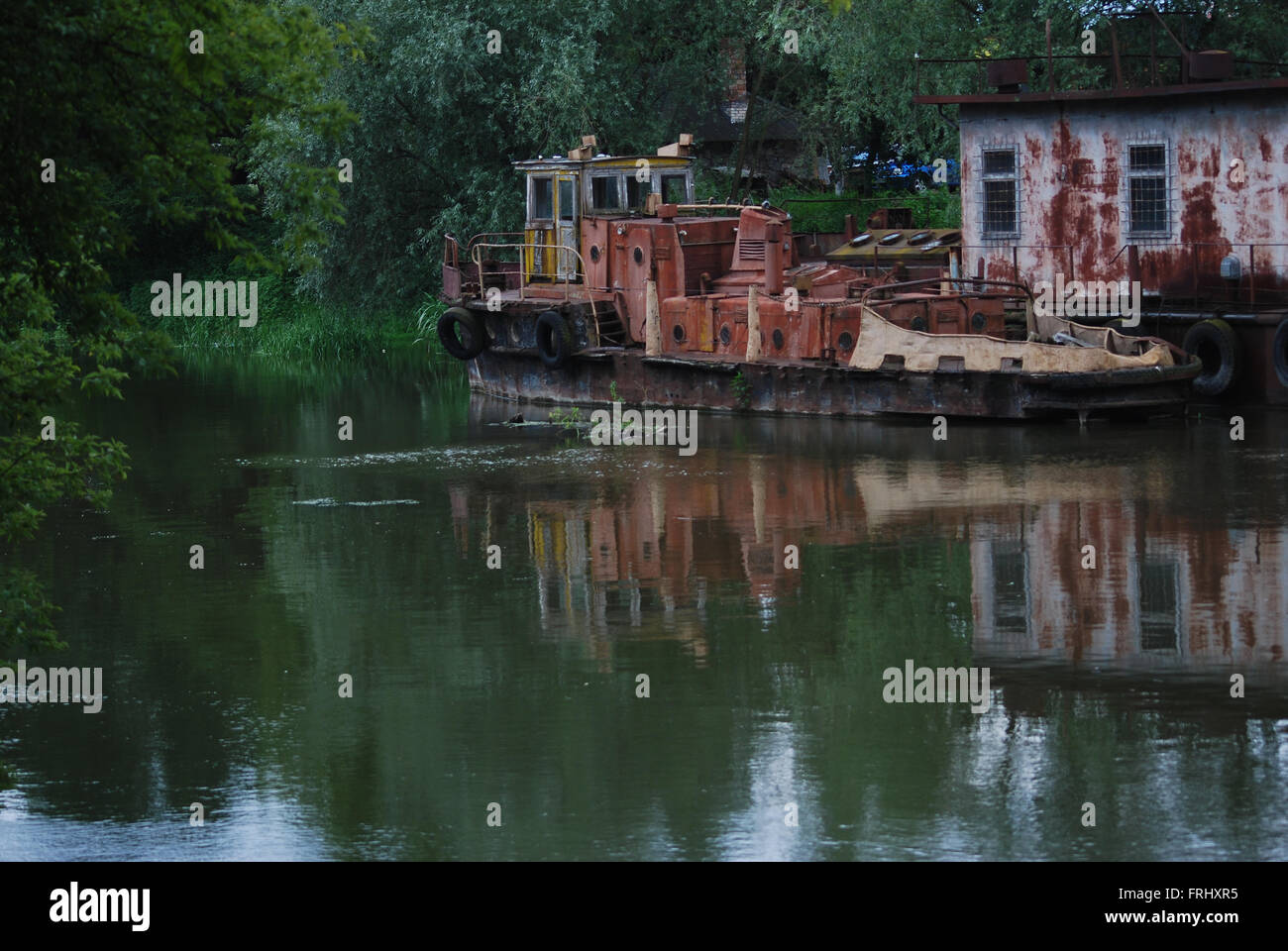 Old rusty barge and tug Stock Photo - Alamy