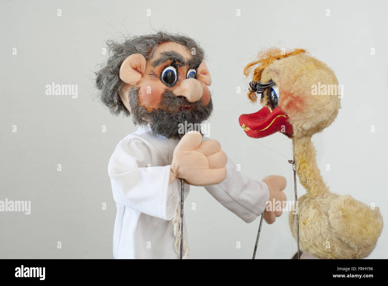 Managed man doll and duck Stock Photo - Alamy