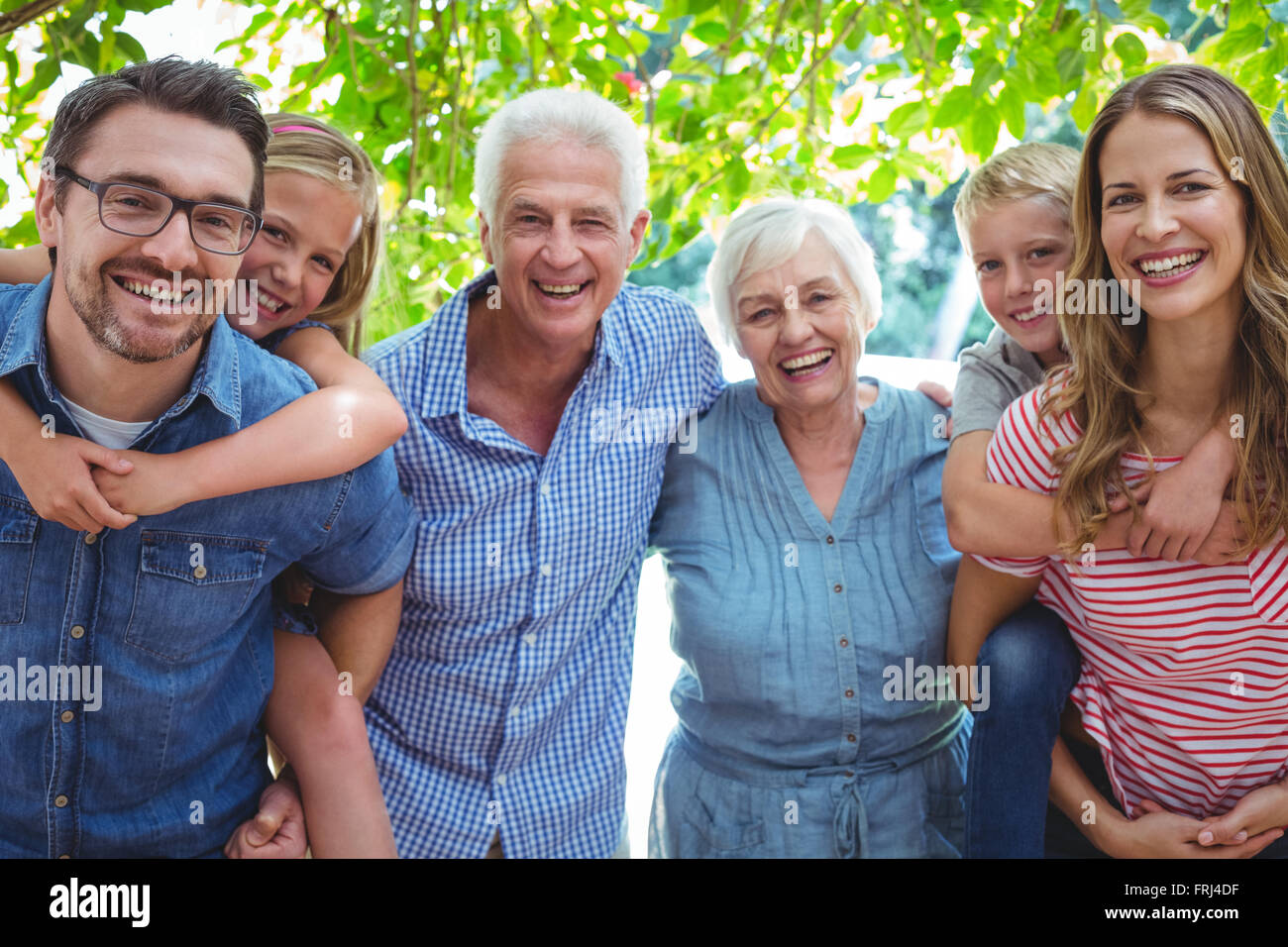 Portrait of smiling family with grandparents Stock Photo - Alamy
