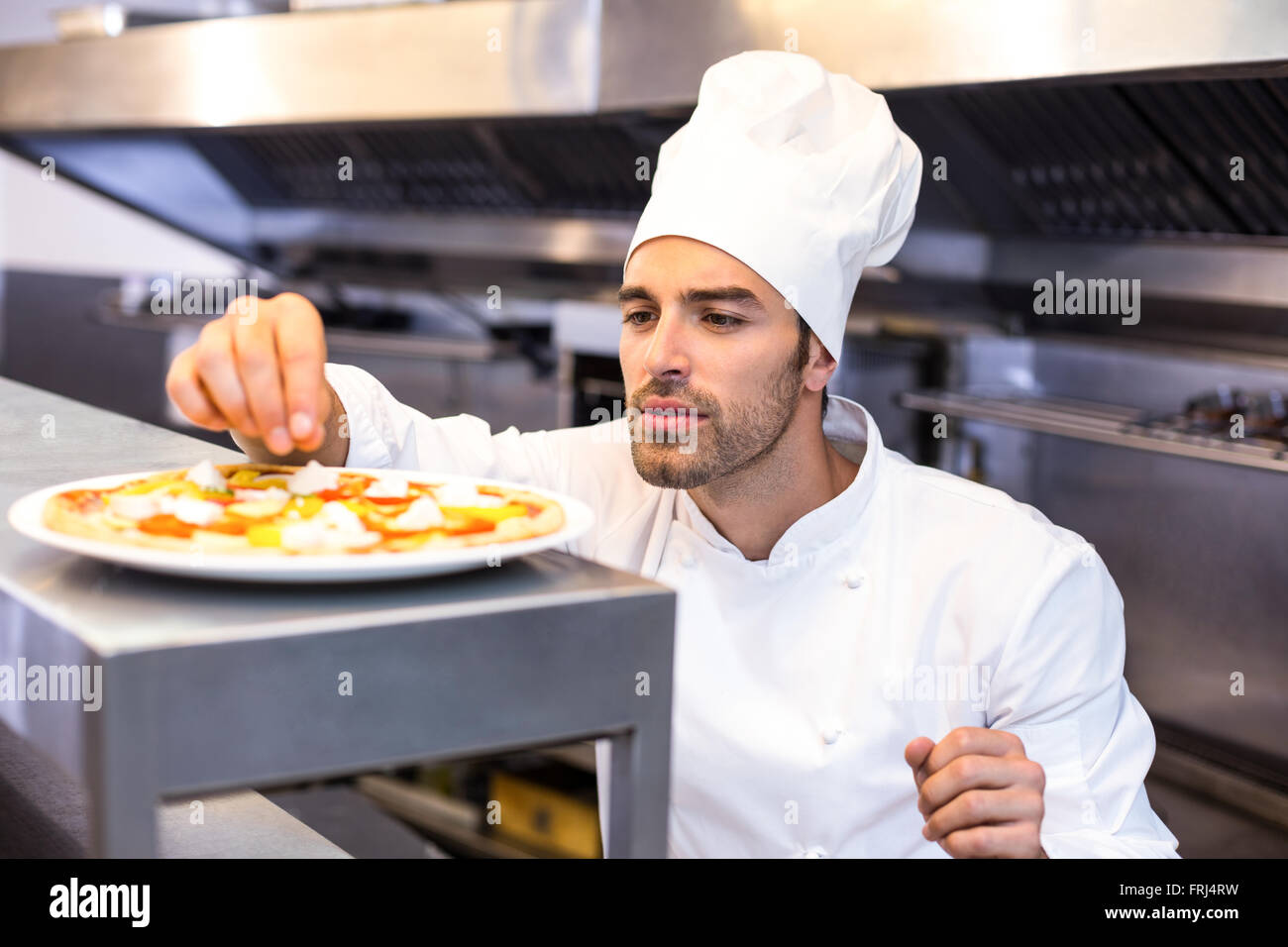 Pizza chef making pizza Stock Photo - Alamy