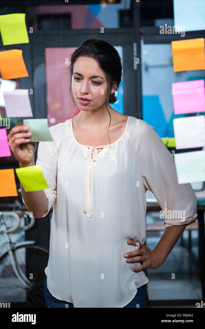 Looking at note hi-res stock photography and images - Alamy