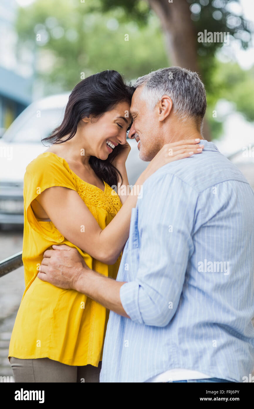 Side view of romantic couple Stock Photo - Alamy