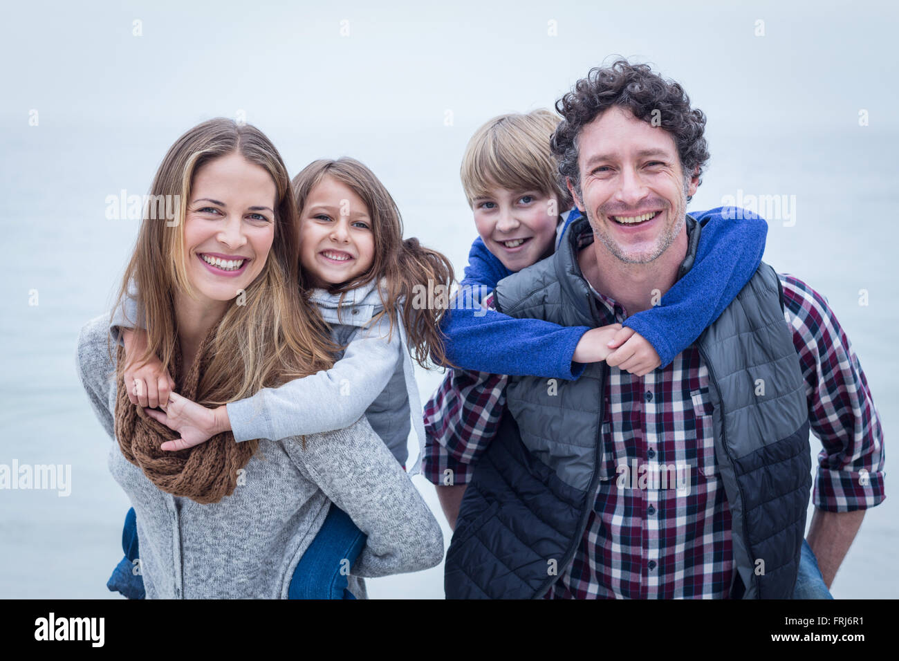 Two parents two children vacation close hi-res stock photography and ...