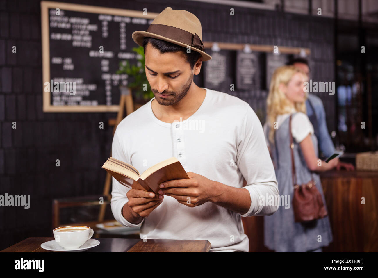 Man reading a book Stock Photo - Alamy