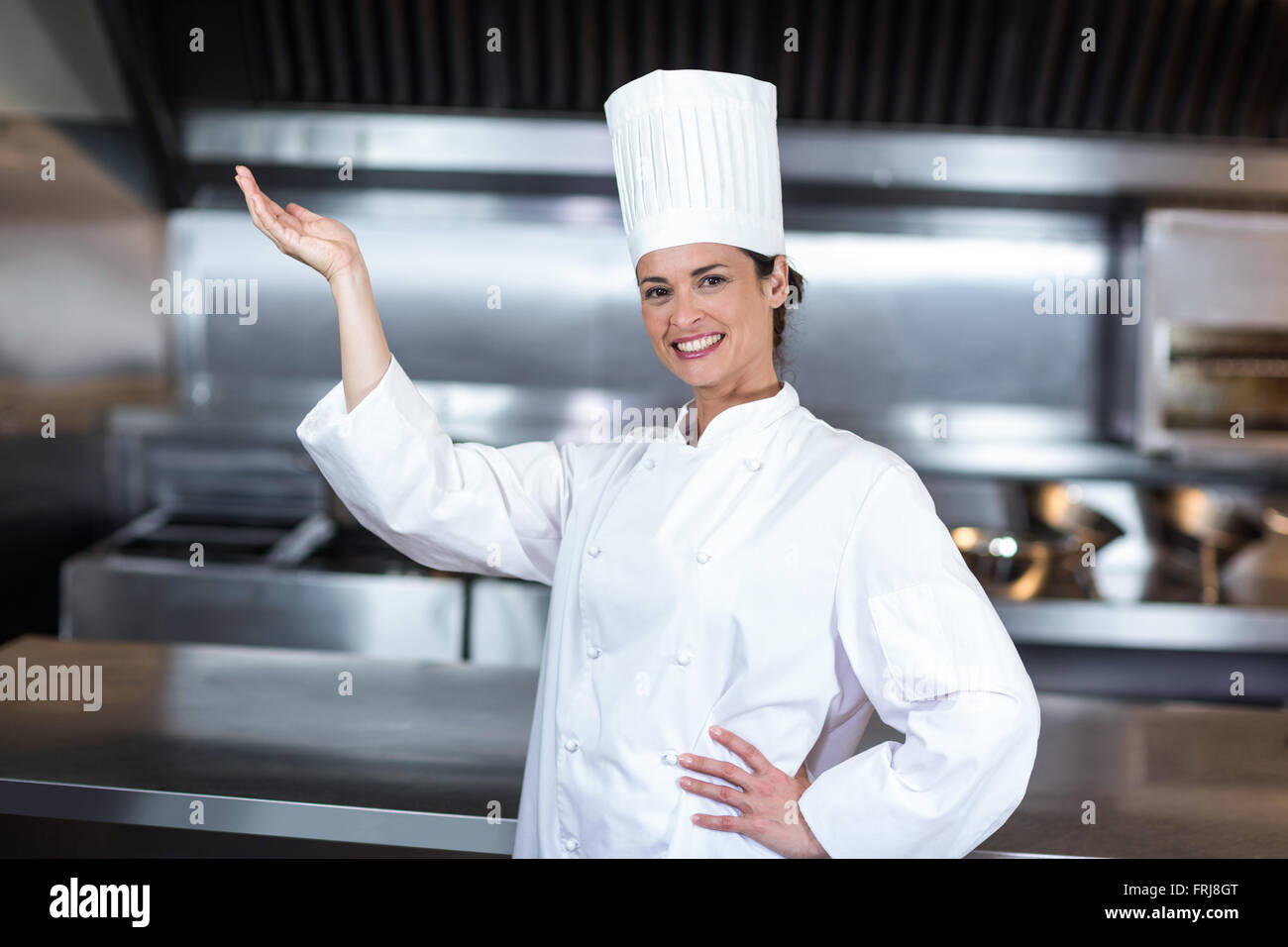 Beautiful female chef cooking kitchen hi-res stock photography and ...