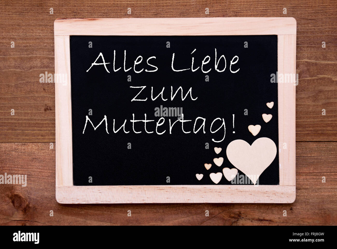 Blackboard With Wooden Hearts, Text Muttertag Means Happy Mothers Day ...