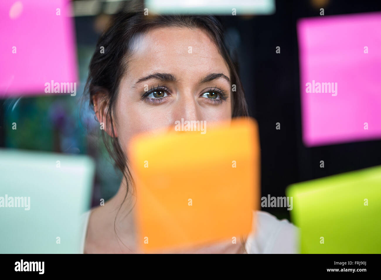 Looking at note hi-res stock photography and images - Alamy